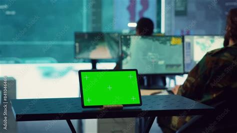 Tablet With Greenscreen Display Running In A Command Post Base Of