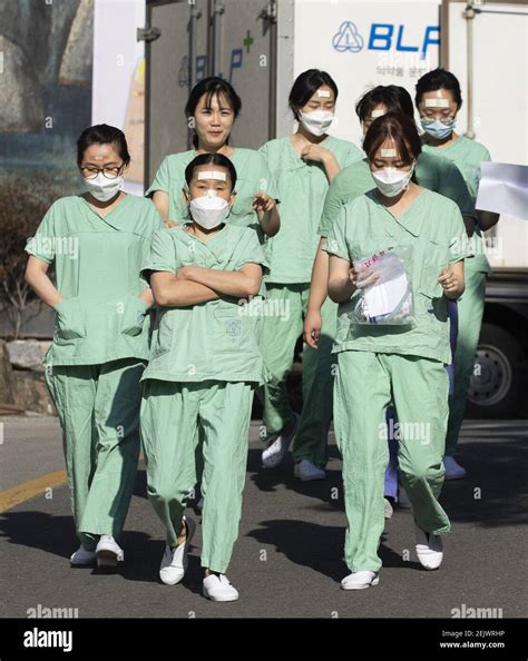 South Korean Medical Staff Members Arrive For A Duty Shift At Keimyung