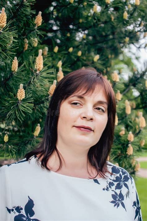 Mature Real Fat Brunette Woman In Green Spring Park Lifestyle Concept