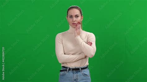 Portrait Of Unwell Sad Woman Having Tooth Pain Posing At Chromakey
