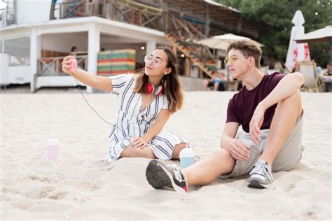 Free Photo Teenagers Chilling Together At The Beach