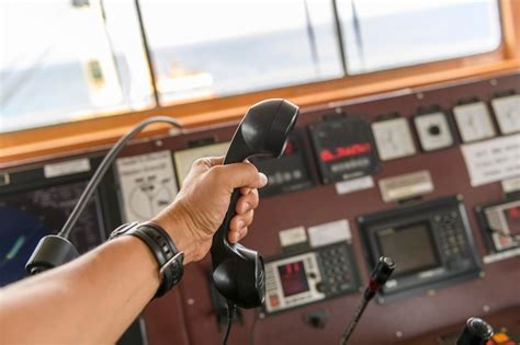Premium Photo Navigational Control Panel And Vhf Radio With Hand