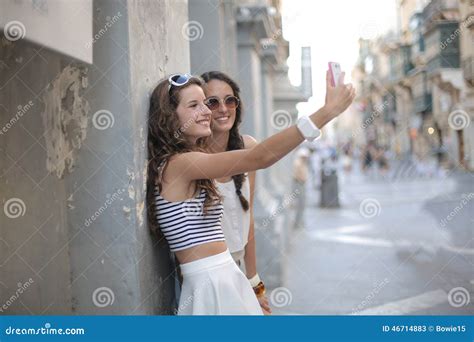Two Sisters Doing A Selfie Stock Image Image Of Happy 46714883