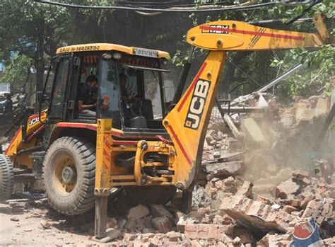 Illegal Houses Of Two Men Accused Of Raping Minor Girls Razed With