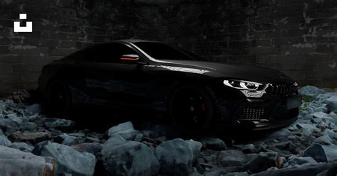 검은 차 한 대가 돌무더기에 주차되어 있습니다 사진 Unsplash의 무료 자동차 이미지