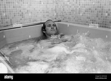 Pittsburgh Steelers Quarterback Terry Bradshaw Relaxes In A Hot Sudsy Bath After A Team Workout