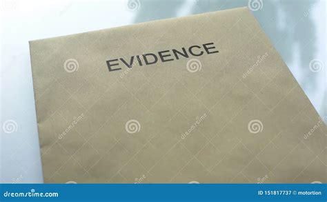 Evidence Folder With Important Documents Lying On Table Police Investigation Stock Image