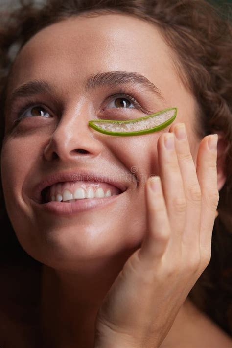 Beauty Face Woman Holding Slices Of Fresh Juicy Aloe Vera Leaf At Her Face Stock Image Image