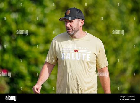 Washington Commanders Offensive Coordinator Scott Turner Walks To