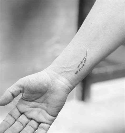 Fine Line Lavender Tattoo On The Wrist