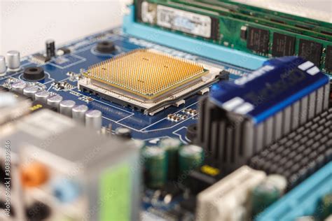 Computer CPU Close Up On The Motherboard Background Socket Of Central Process Unit Connection