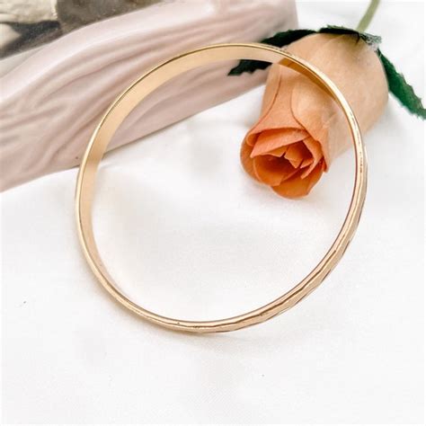 1970s Monet Goldtone Bangle Braceletbrushed And Shin Gem