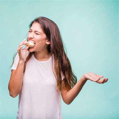Free Photo Brunette Girl Eating Pastry