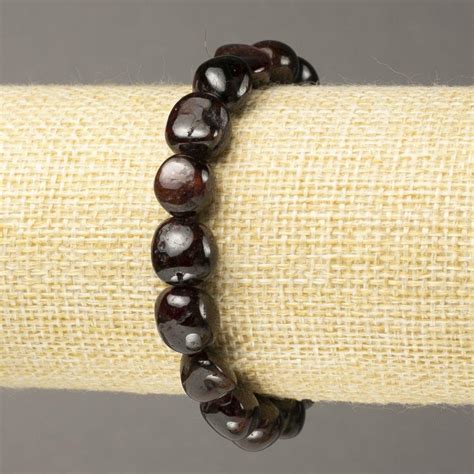 Браслет на гумці натуральний камінь Гранат округлий галтовка D 11х10мм продаж ціна у Одесі