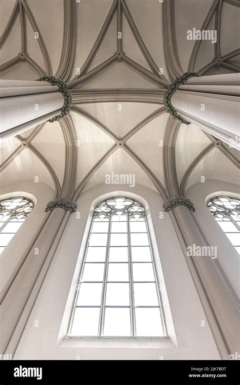 Bright Interior Of The Church With Stained Glass Windows View From