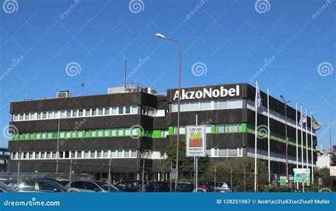 Main Building Of Akzo Nobel Chemical Plant With Tanks And Pipes In The