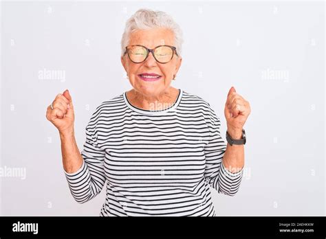Senior Grey Haired Woman Wearing Striped Navy T Shirt Glasses Over