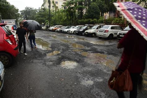 In Photos Potholes Resurface Waterlogging In Mumbai After Heavy Rainfall