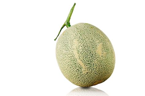 Premium Photo Close Up Of Cantaloupe Against White Background