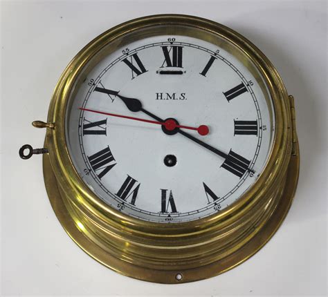 A Mid 20th Century Brass Circular Cased Ships Timepiece The Eight Day