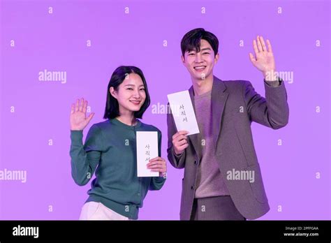 Business Working Concept Young Korean Asian Woman And Man Holding A