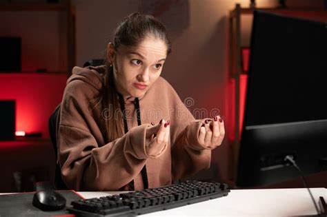 Female Programmer Working Overtime At Night At Home Doing Money Gesture With Hands Asking