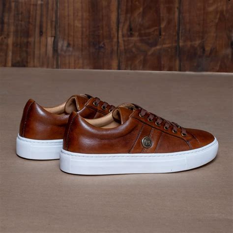 Kingsley Heath S Round Nguni Trim Sneaker Tanbrasswhite