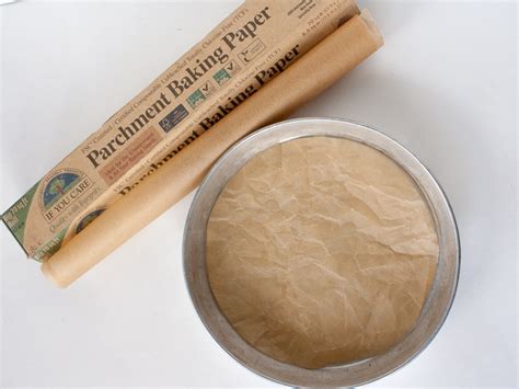 The Trick To Keep Parchment Paper From Rolling Up