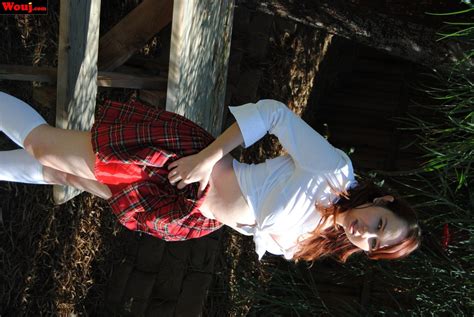 Sexy Schoolgirl Showing Her White Panties Outdoors Photos