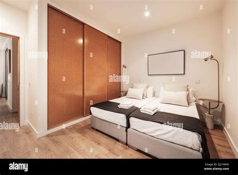 Double Bedroom With Large Built In Wardrobe With Sliding Wooden Doors