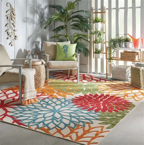 A Floral Multicolor Rug That Adds A Beautiful Pop Of Bright Color To