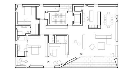 Angled Openings Create Balconies Across The Facade Of Mora Apartments