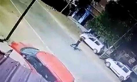 Uttar Pradesh Speeding Car Rams Into Man Busy On Phone While Crossing