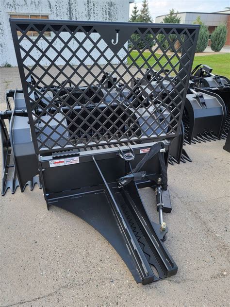 TREE PULLER Greenwood Equipment Skid Steer Attachments Eau Claire Chippewa Falls Wisconsin