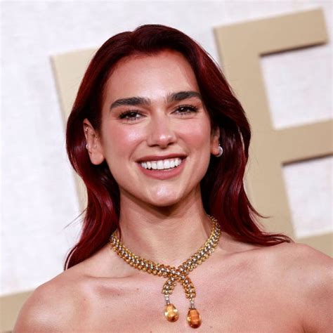 Dua Lipa Wore A Prada Gown That Perfectly Matches Her Hair