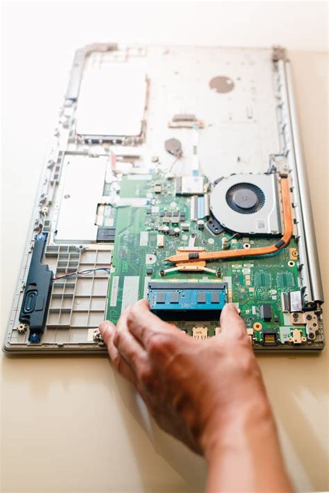 Memory Module Ddr4 Ram Installation In Laptop By Hand Stock Image