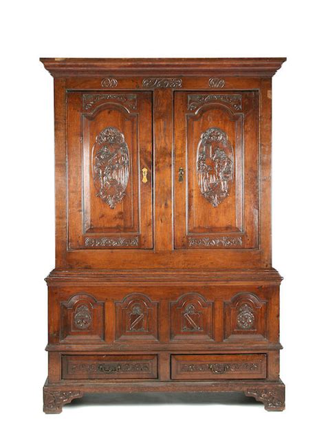 Bonhams A Mid 18th Century And Later Carved Oak Press Cupboard