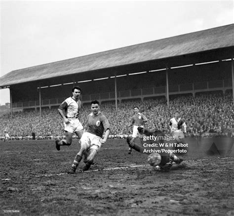 Billy Liddell Of Liverpool Shoots Past Blackburn Rovers Goalkeeper