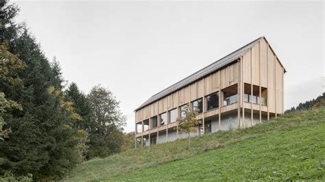 Bernardo Bader Perches Larch Clad Home Over Concrete Plinth In Austrian