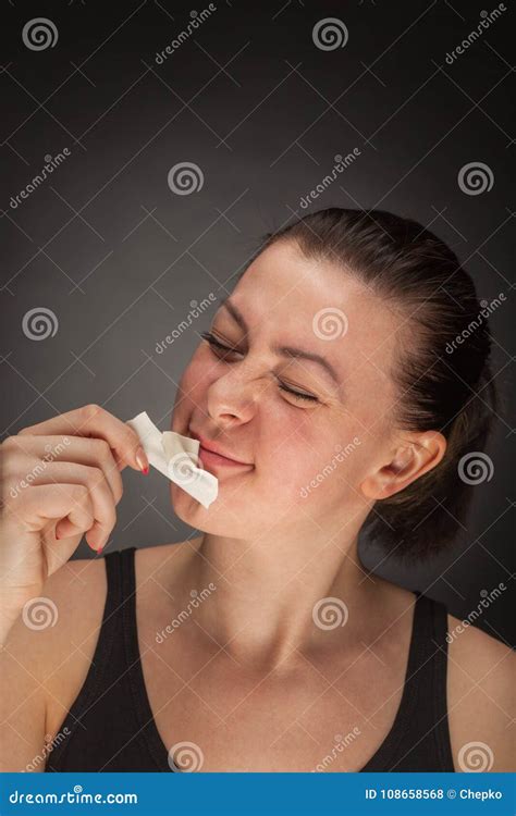 A Beautiful Girl With A Gag In Her Mouth As A Symbol Of Censorship