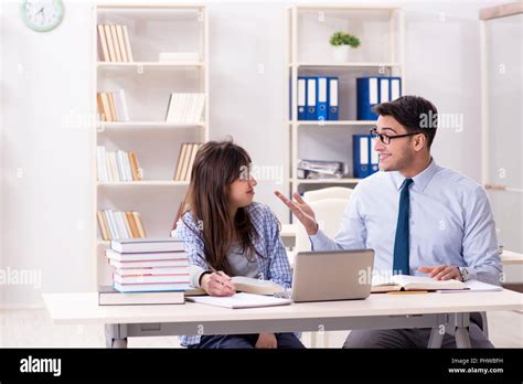 Male Lecturer Giving Lecture To Female Babe Stock Photo Alamy