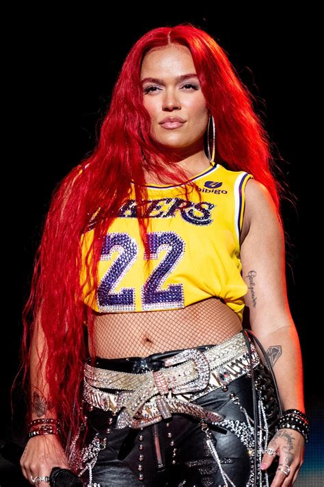 Karol G Posed In Nothing But Mermaid Waves And A Hair Bow