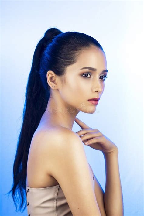 Close Up Portrait Of A Brunette Girl With Nude Make Up And Naked Stock