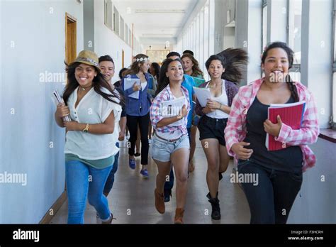 Babes Running Down Hallway Laughing Stock Photo Alamy