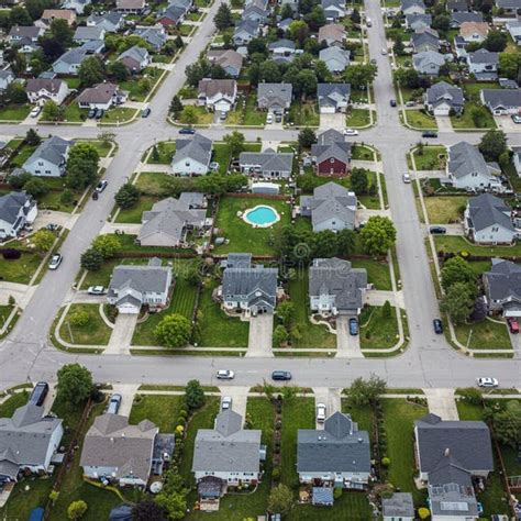 Suburban Neighborhood Aerial View Showcasing A Grid Layout Of Residential Streets Stock