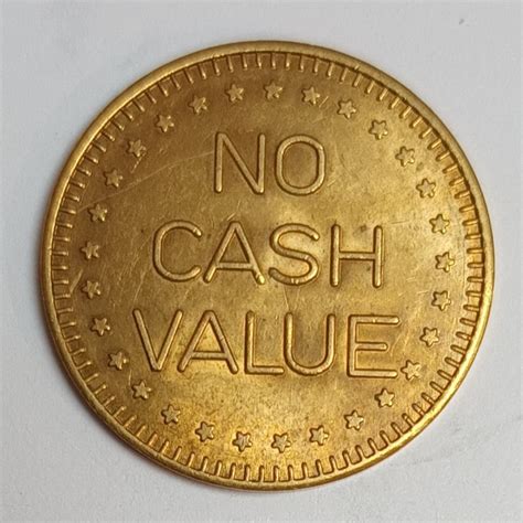 united states gaming token no cash value on obverse and reverse eagle