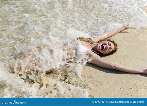Woman Splashed By Wave On The Beach Stock Image Image Of Ocean Sensual 13991401