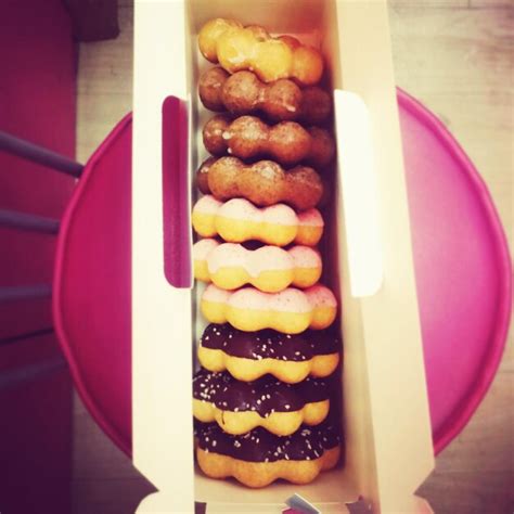 Premium Photo High Angle View Of Donuts In Container