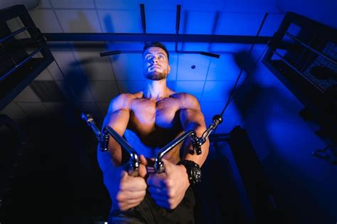 Premium Photo A Strong Man Holding Sharp Scissors Ready To Cut A Shirtless Man Holding A Pair