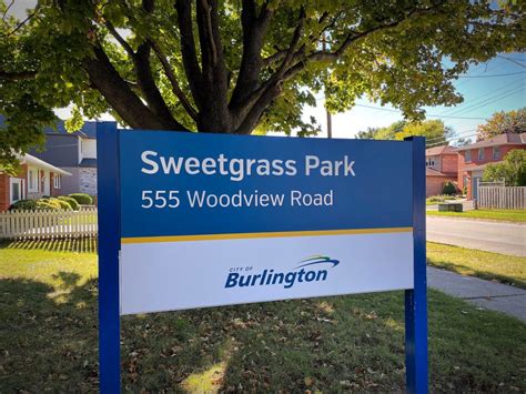 City Of Burlington Installing Orange Crosswalk And Sweetgrass Park Sign